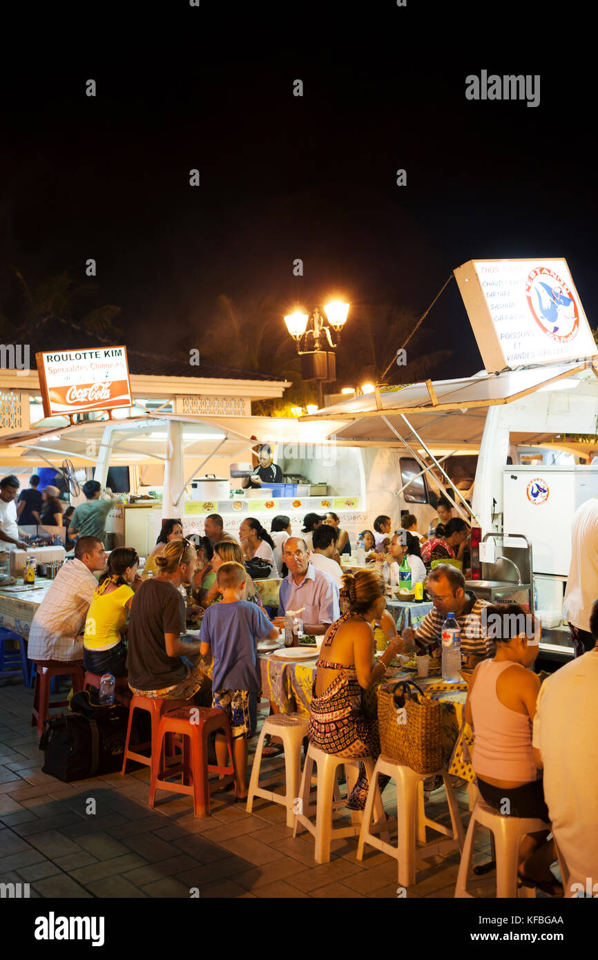 FRENCH POLYNESIA, Tahiti. Roulotte Food Trucks at night at the dock in ...