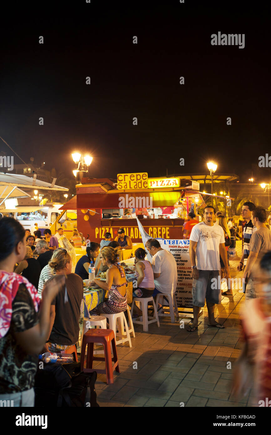 FRENCH POLYNESIA, Tahiti. Roulotte Food Trucks at night at the dock in ...