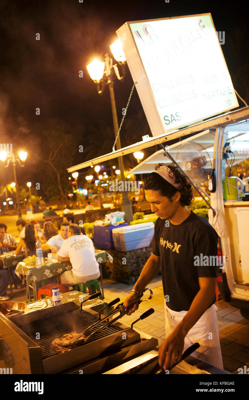 FRENCH POLYNESIA, Tahiti. Roulotte Food Trucks at night at the dock in ...
