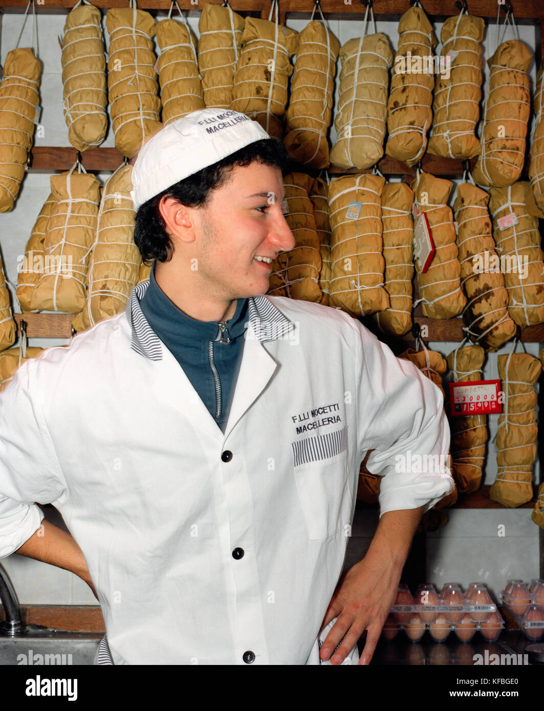 ITALY, Orvieto, Umbria, young butcher Emilio Gazzura in his family's ...