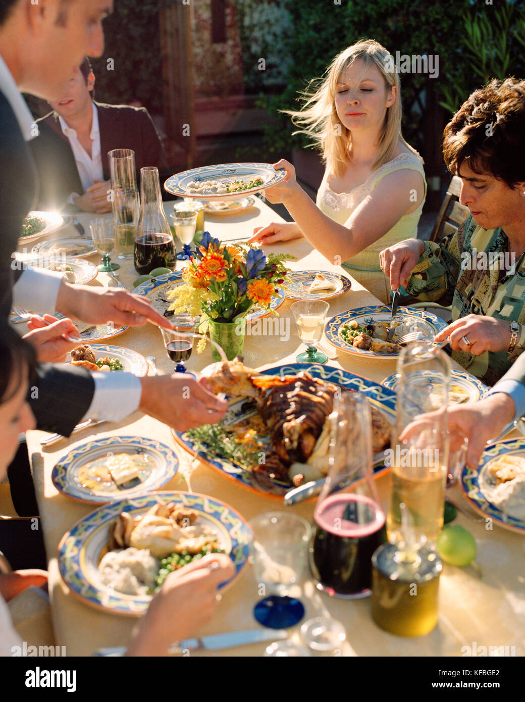 ITALY, Orvieto, Umbria, family having lunch outdoors Stock Photo - Alamy