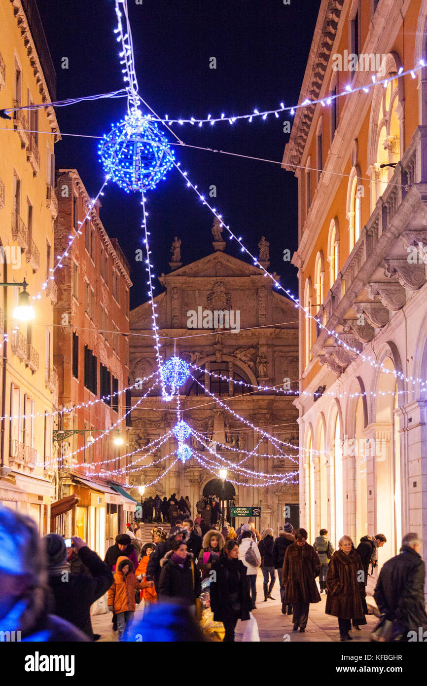 ITALY, Venice. Christmas decorations hangs over Campo San Moise along ...