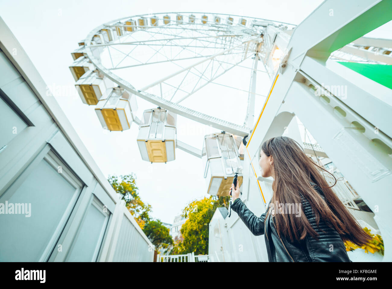A beautiful woman holding two tickets Stock Photo - Alamy
