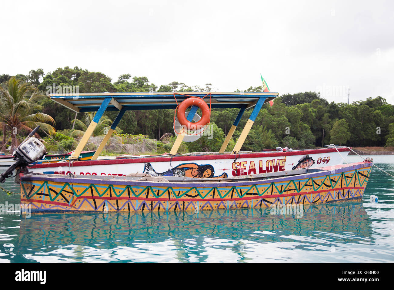 JAMAICA, Oracabessa. Local fishing boats docked by the bay Stock Photo ...