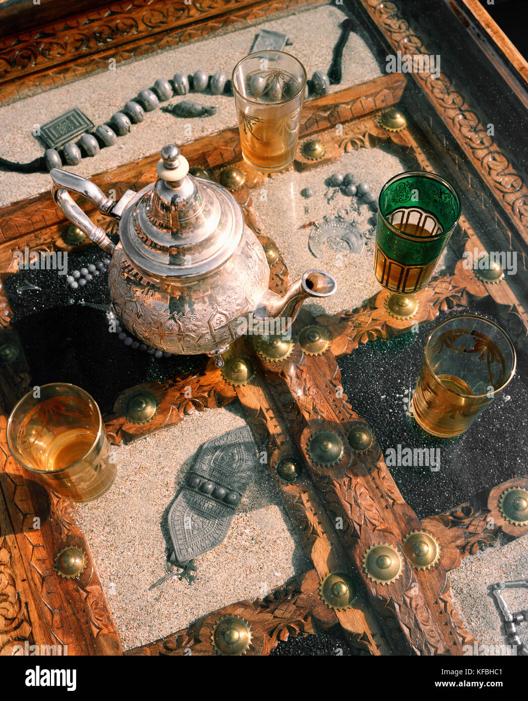 OMAN, Muscat, Barr Al Jissah Resort and Spa, silver teapot and glass ...