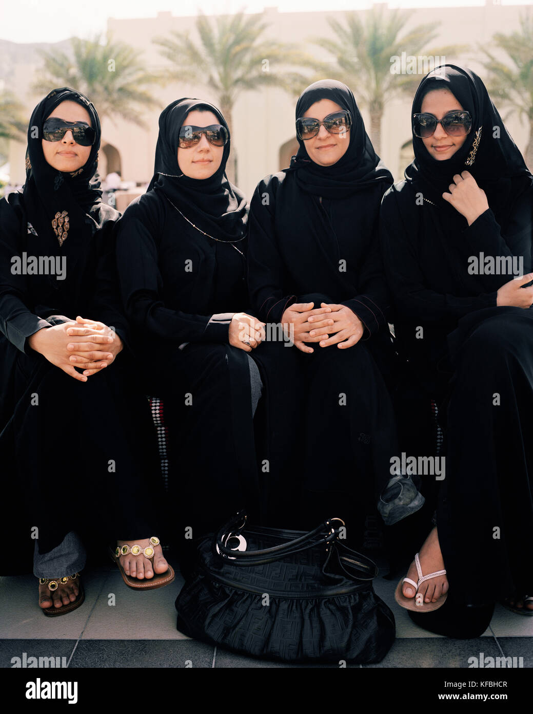 OMAN, Barr Al Jissa Resort and Spa, Muslim women sitting side by side ...
