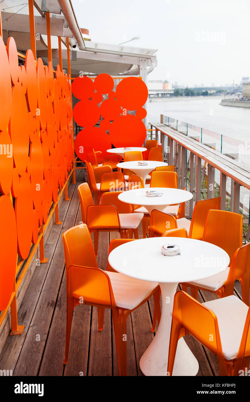 RUSSIA, Moscow. Tables at the roof restaurant at Bar Strelka which ...