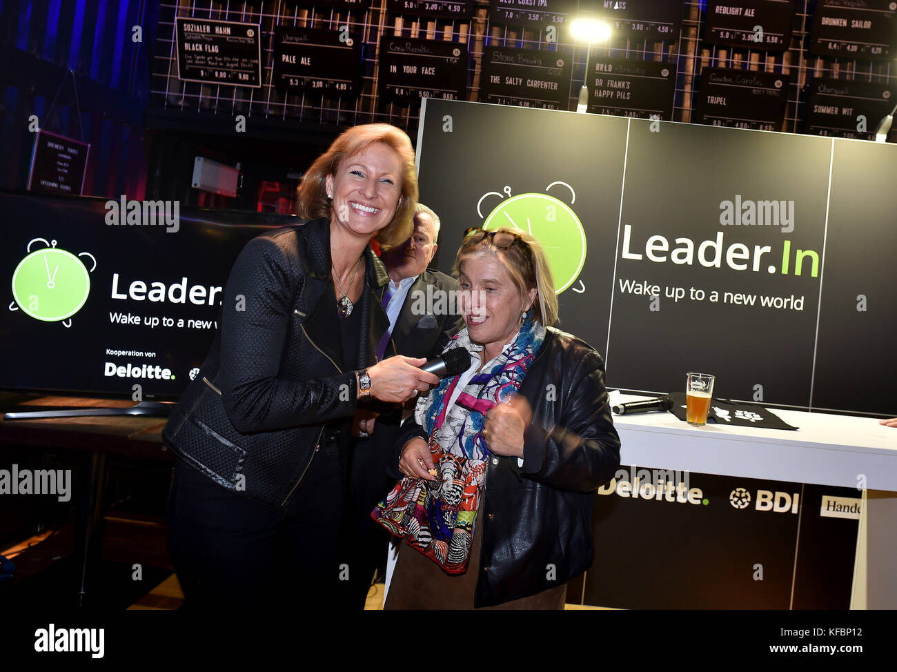 BERLIN/GERMANY - OCTOBER 26: Elisabeth Denison (Deloitte, l.) smiles ...