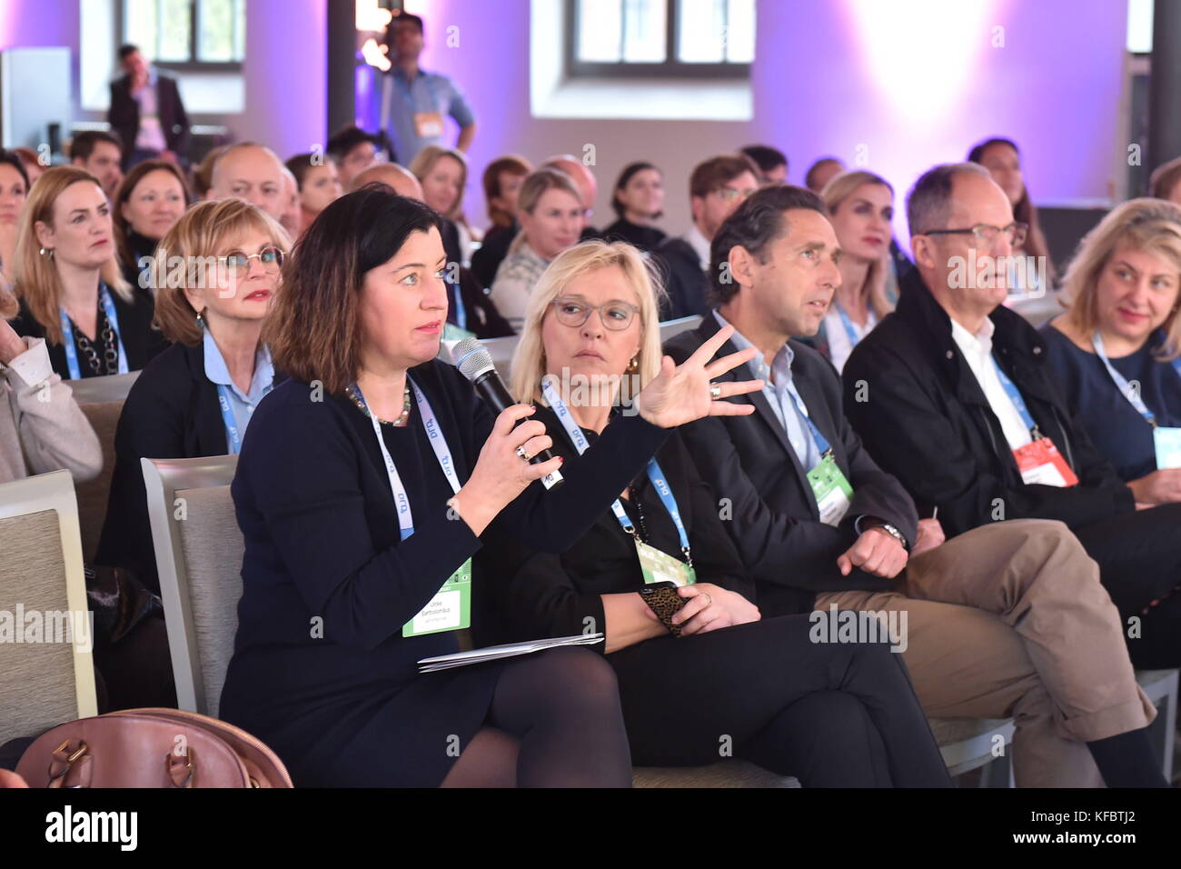 BERLIN/GERMANY - OCTOBER 27: A participant of the audience asking a ...
