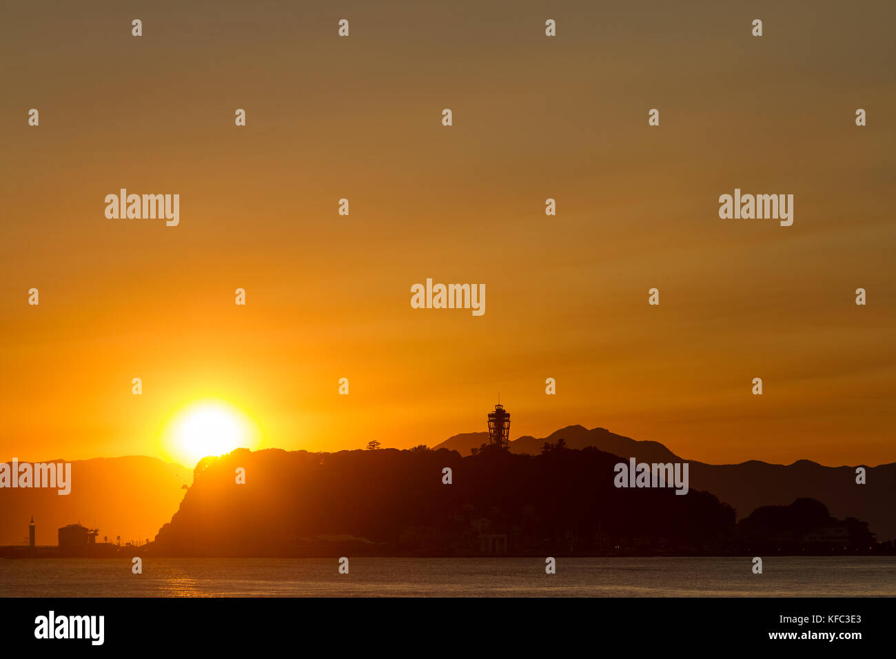 Enoshima island with the Sea Candle lighthouse at sunset, Kanagawa ...