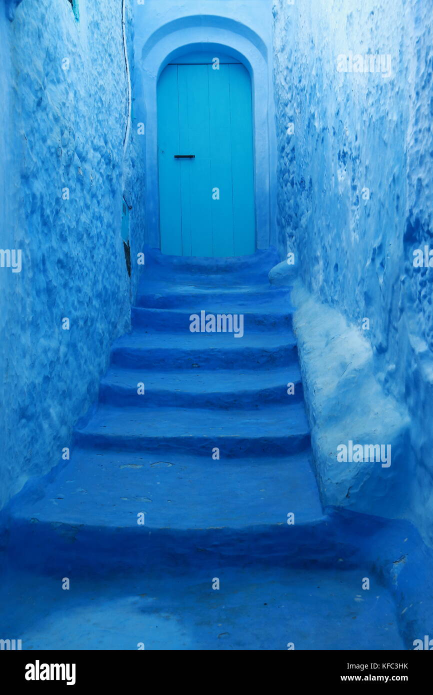 Narrow blue street Stock Photo - Alamy