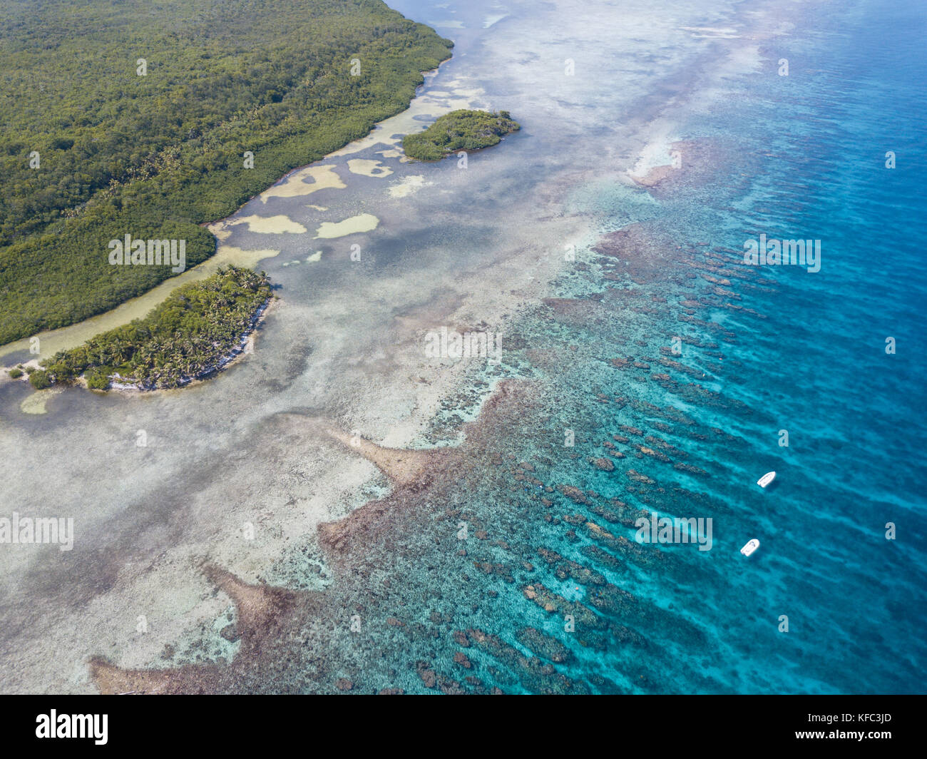 An aerial view of a beautiful coral reef on the edge of Turneffe Atoll ...