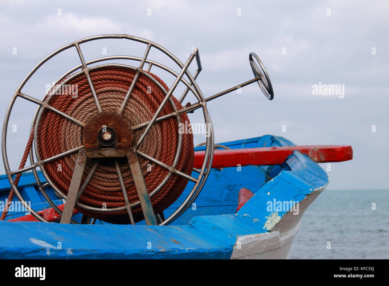 rope coil of a small fishing boat Stock Photo - Alamy