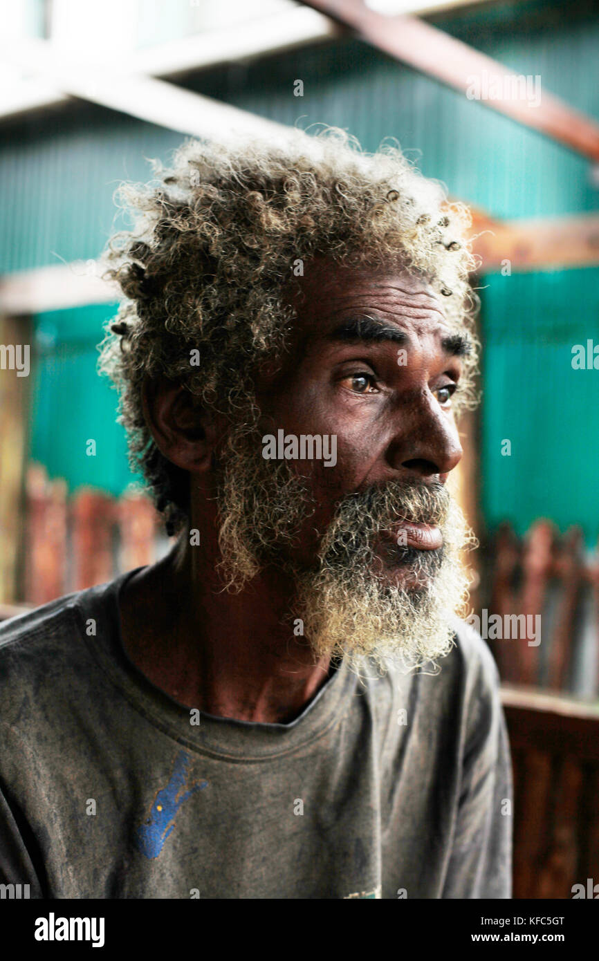 BELIZE, Belize City, portrait of a local man Michael E. Cain at Bar ...