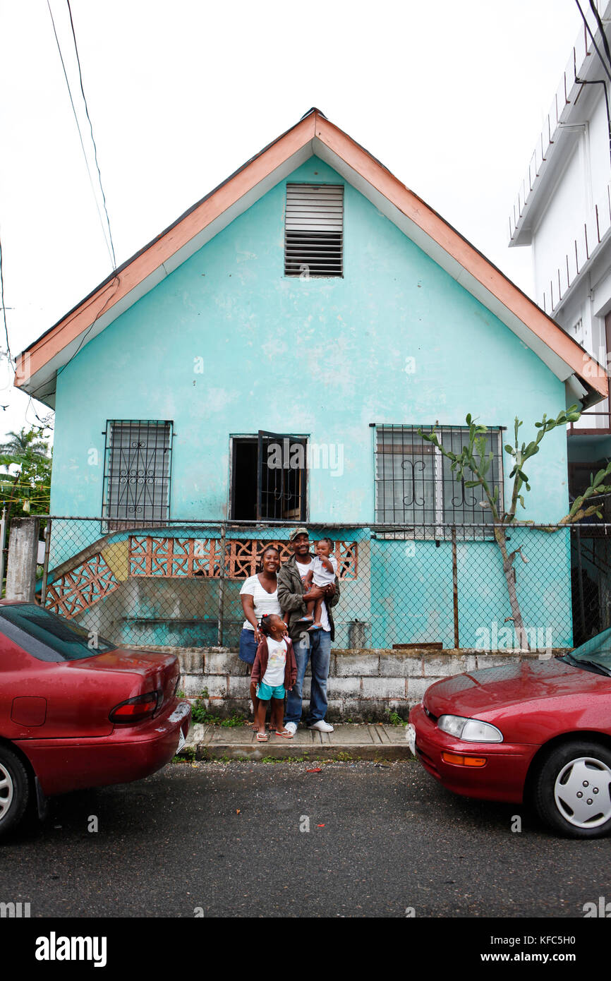 BELIZE. Belize City, the Ramirez family in front of their home on ...