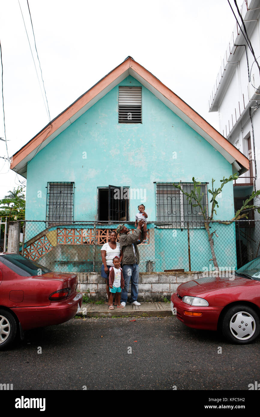 BELIZE. Belize City, the Ramirez family in front of their home on ...