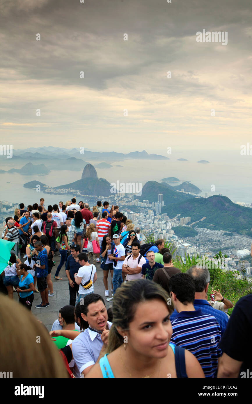 BRAZIL, Rio de Janiero, groups of people gather at the Cristo Redentor ...