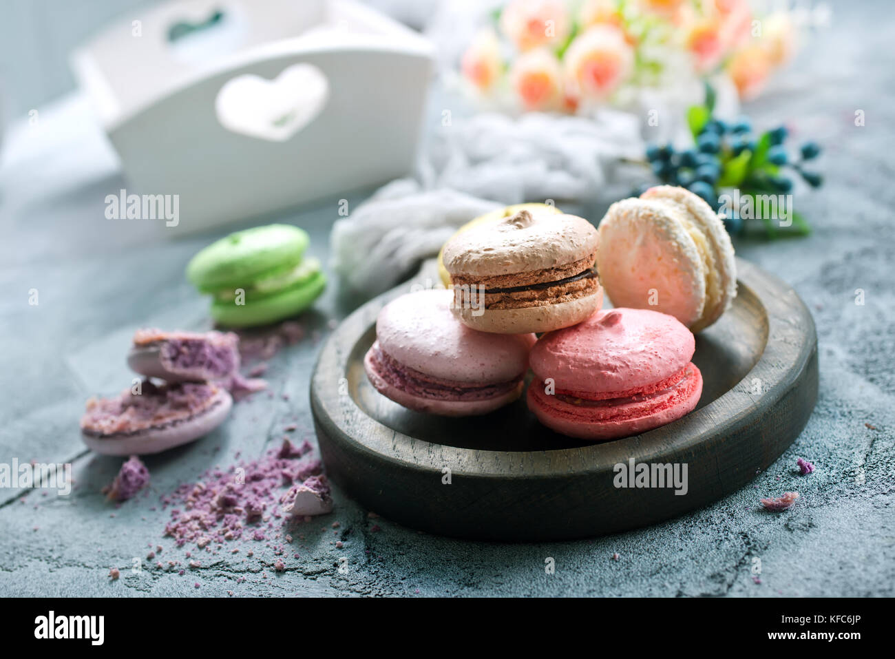macaroons on wooden board and on a table Stock Photo - Alamy