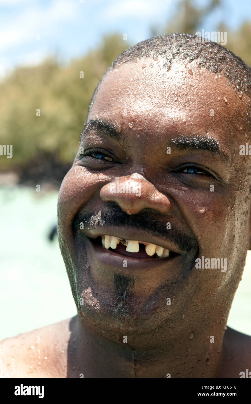 MAURITIUS, portrait of a man on the beach at Ile aux Cerfs Island Stock ...