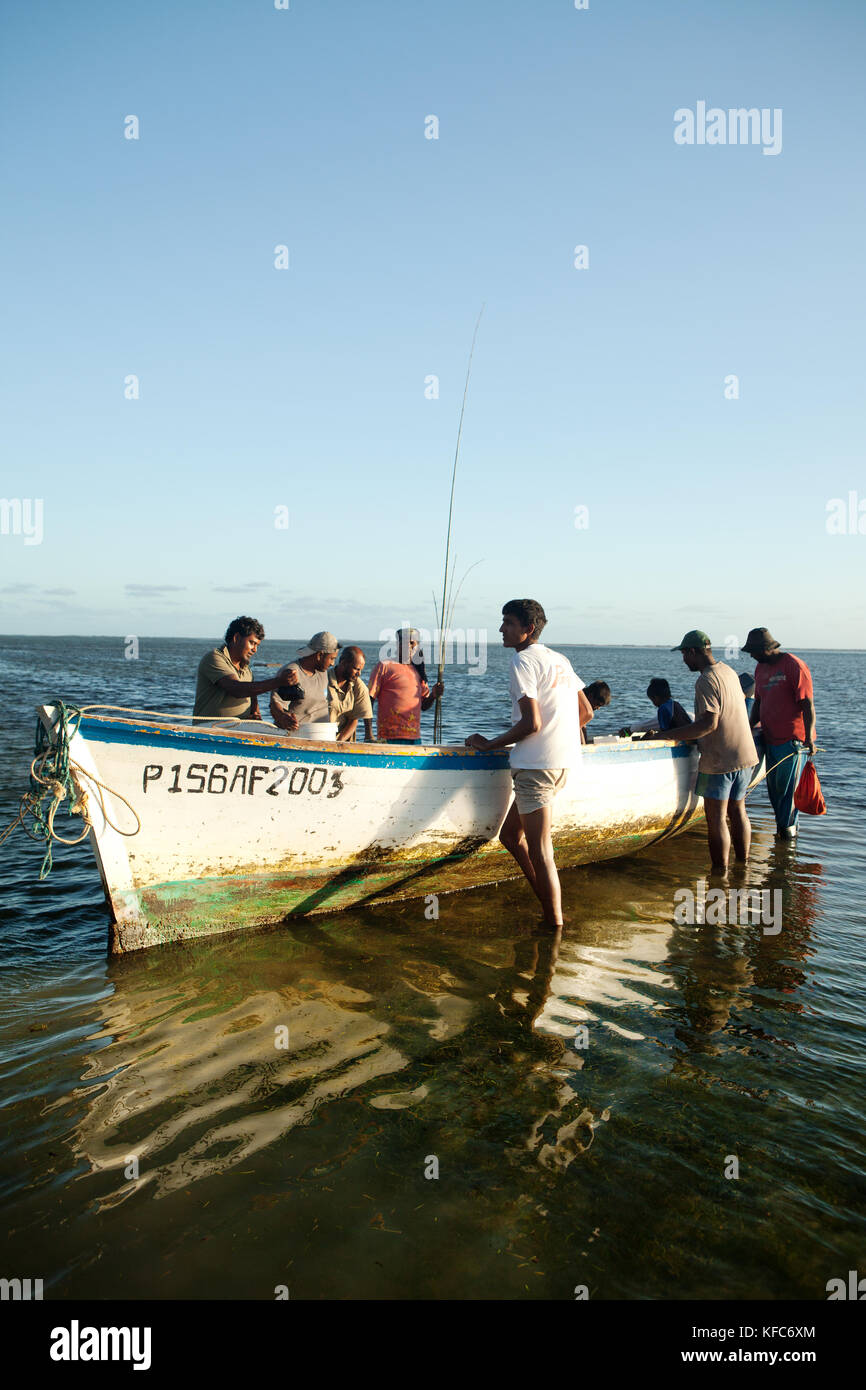Fishermen pull boat hi-res stock photography and images - Alamy