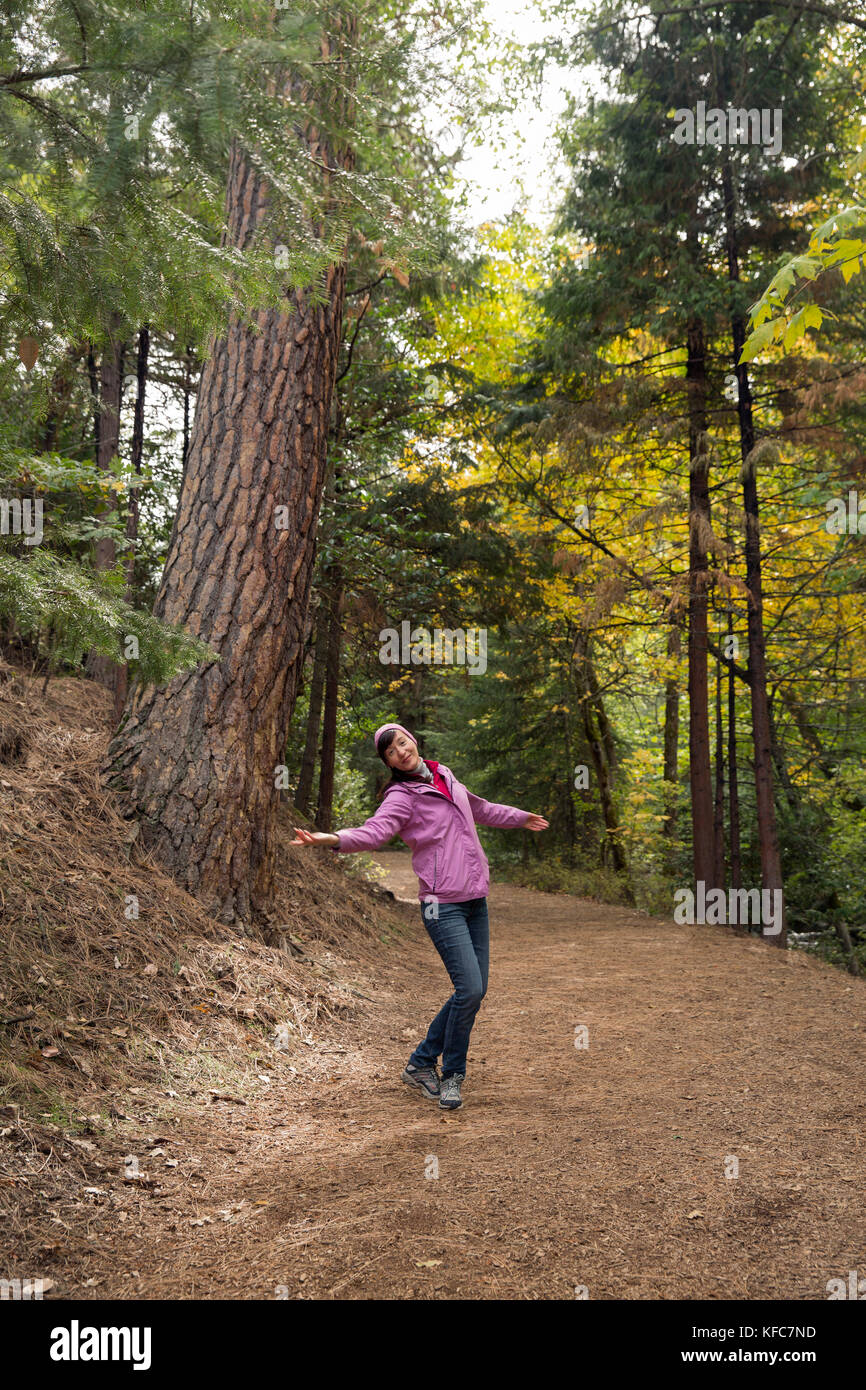 USA, Oregon, Ashland, portait of a Russian dancer in Lithia Park in the ...