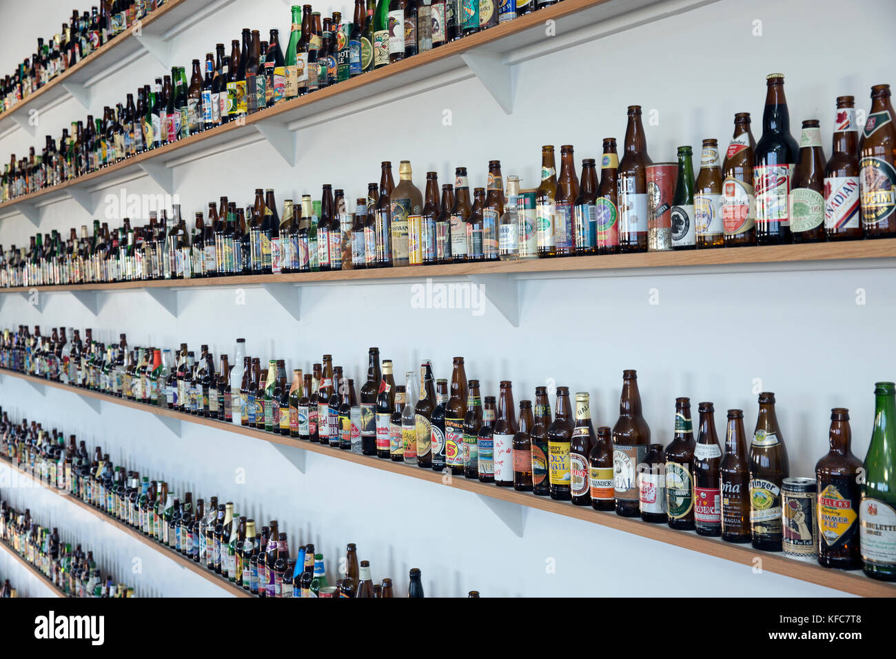 USA, Oregon, Ashland, wall detail of the beer bottle collection at the ...