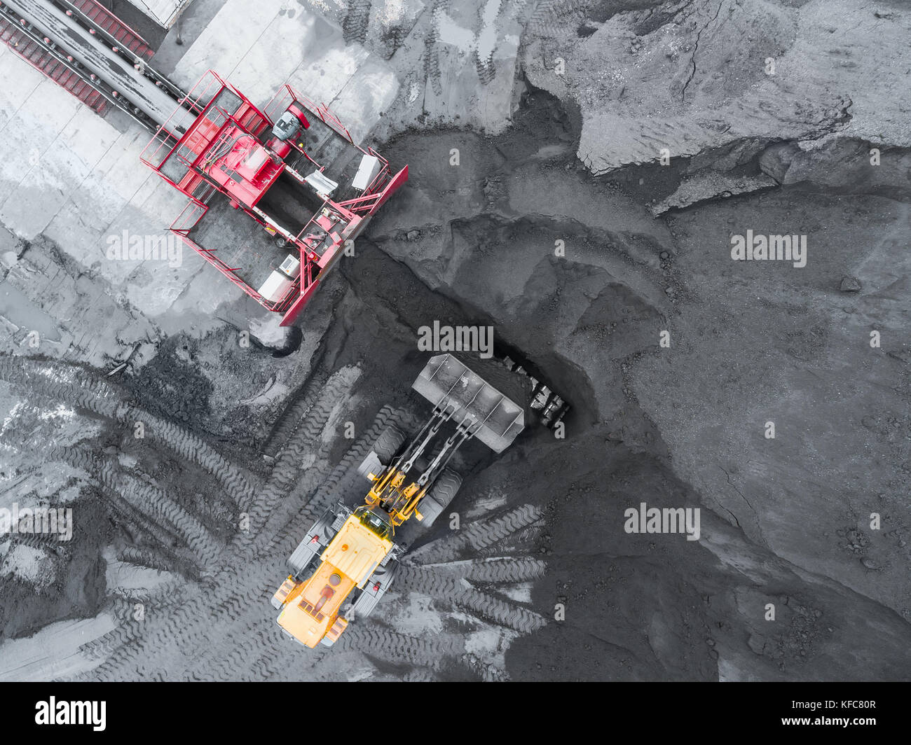 Open pit mine, breed sorting. Mining coal. Bulldozer sorts coal ...