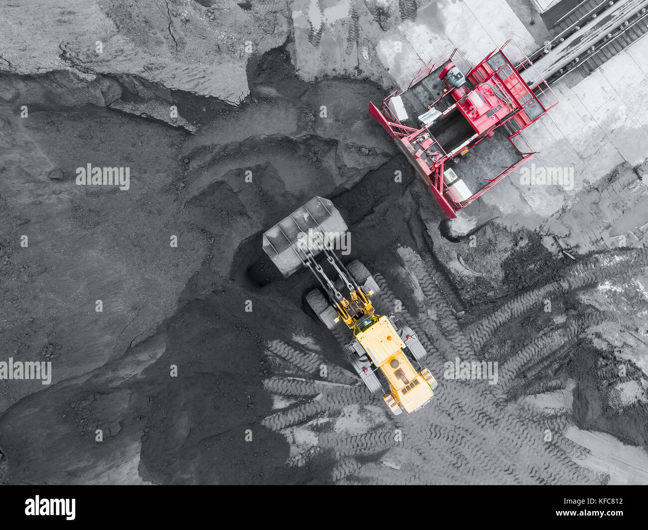 Open pit mine, breed sorting. Mining coal. Bulldozer sorts coal ...