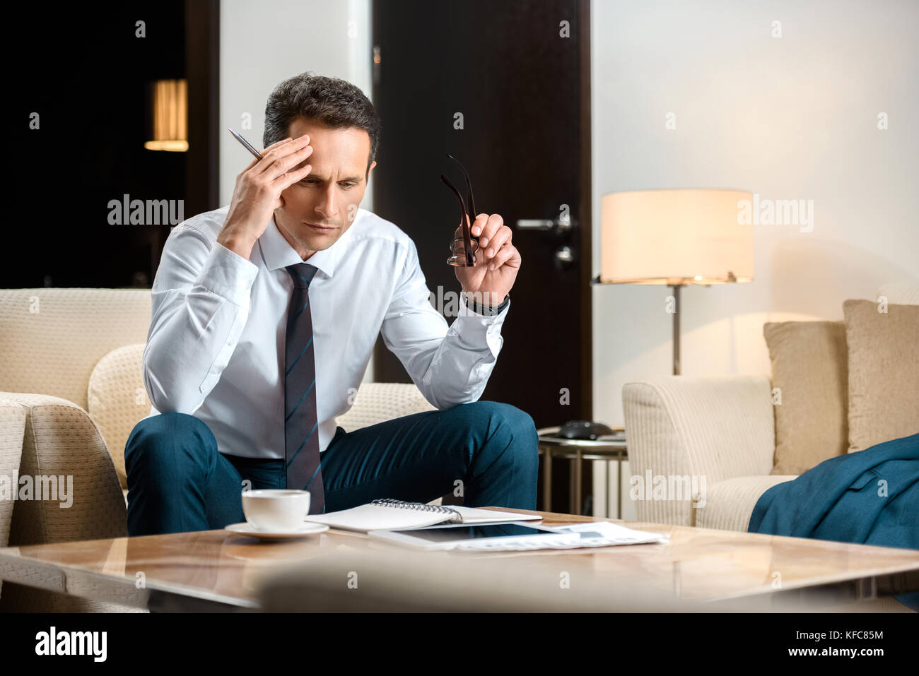 businessman working on paperwork Stock Photo - Alamy