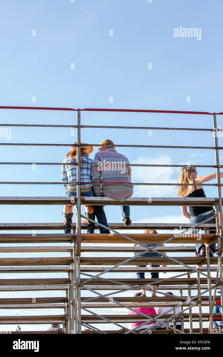 USA, Oregon, Sisters, Sisters Rodeo, spectators watch the events of the ...