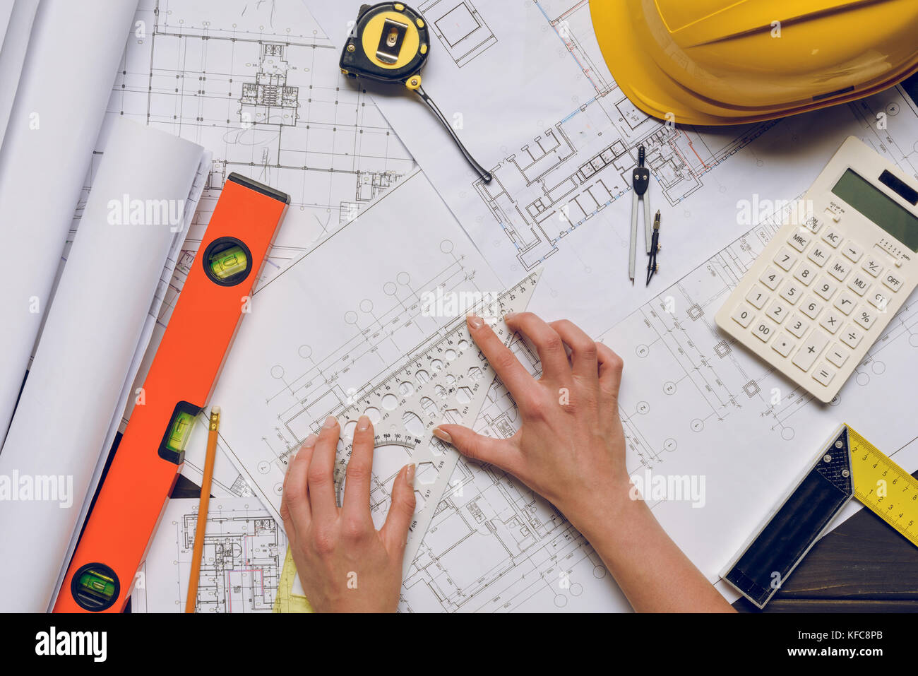 architect working on blueprints Stock Photo - Alamy