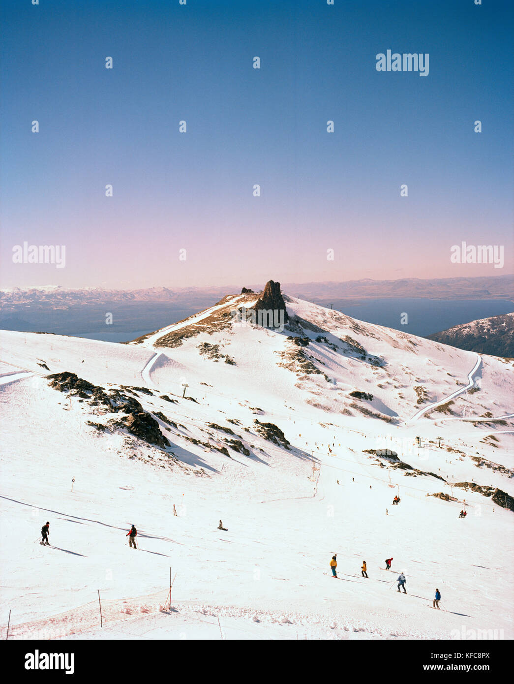 ARGENTINA, Bariloche, Cerro Cathedral, blurred motion of people skiing ...