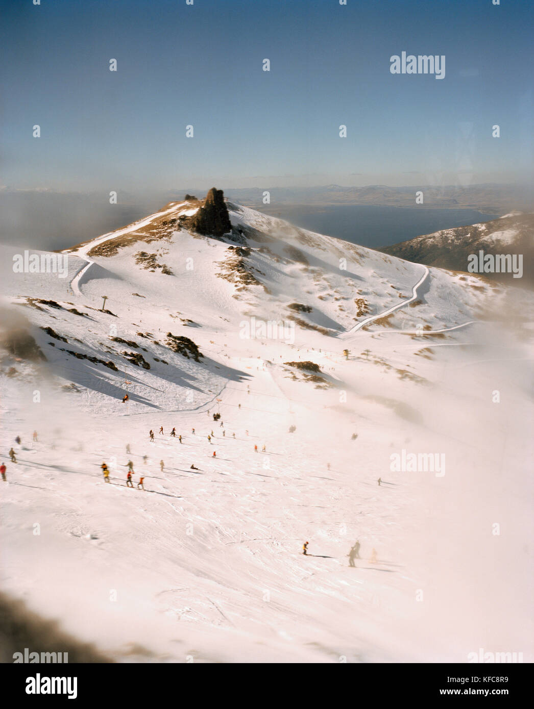 ARGENTINA, Bariloche, Cerro Cathedral, blurred motion of people skiing ...