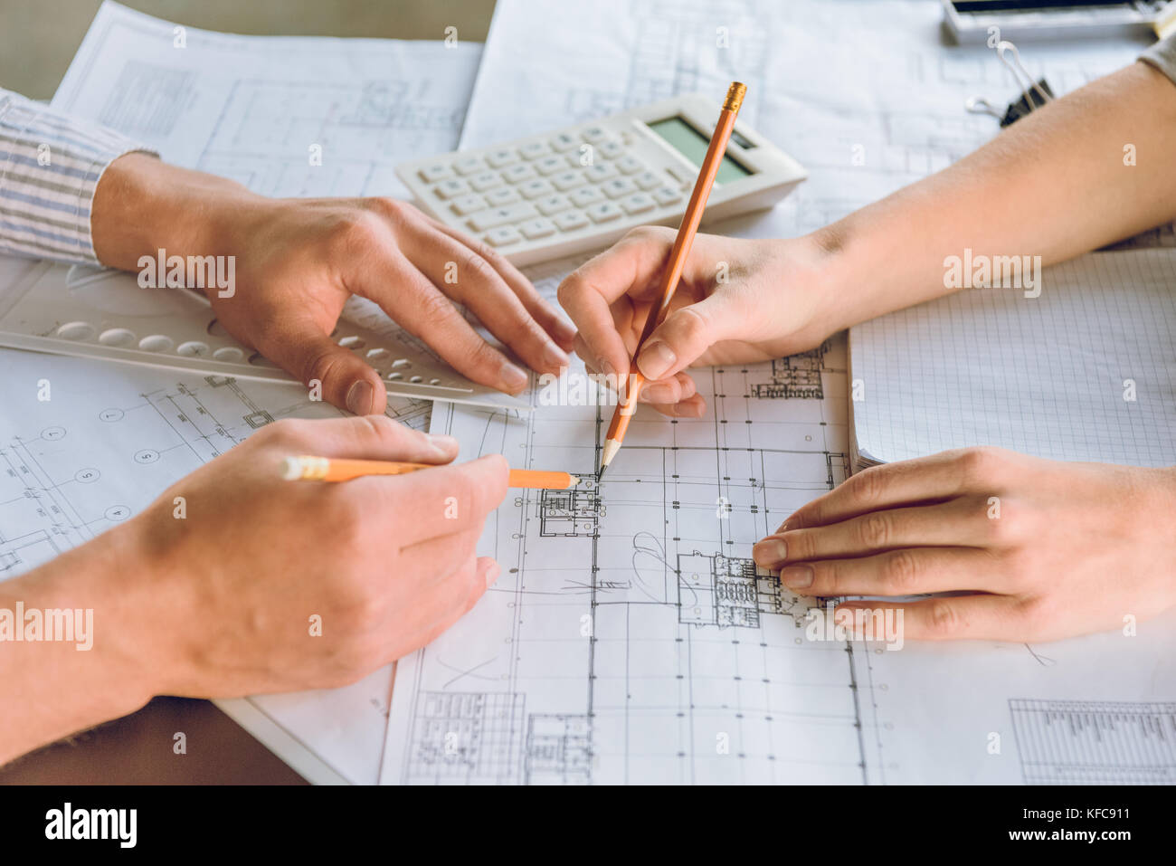 architects working on new plan together Stock Photo - Alamy
