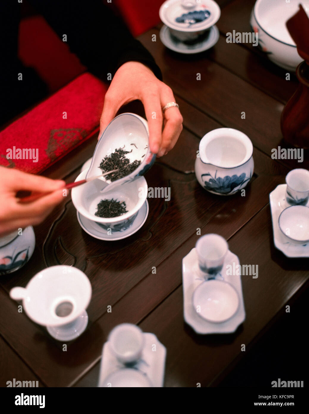 CHINA, Macau, Asia, Sands Macao Hotel, Woman serving Chinese tea, close ...