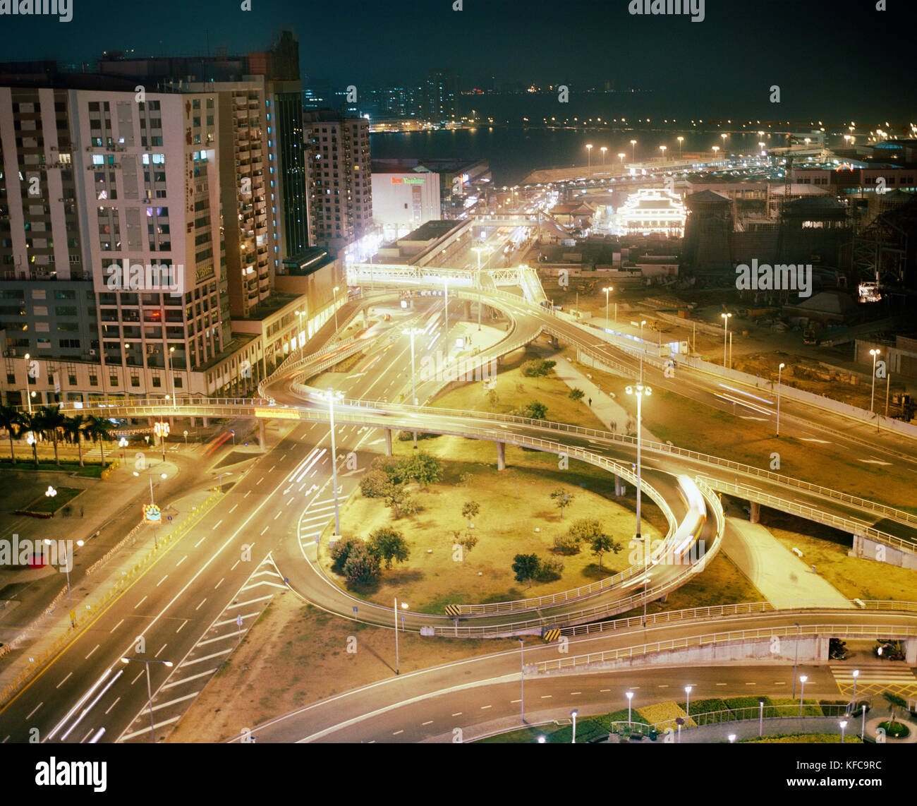 CHINA, Macau, Asia, illuminated bridge by buildings at night Stock ...
