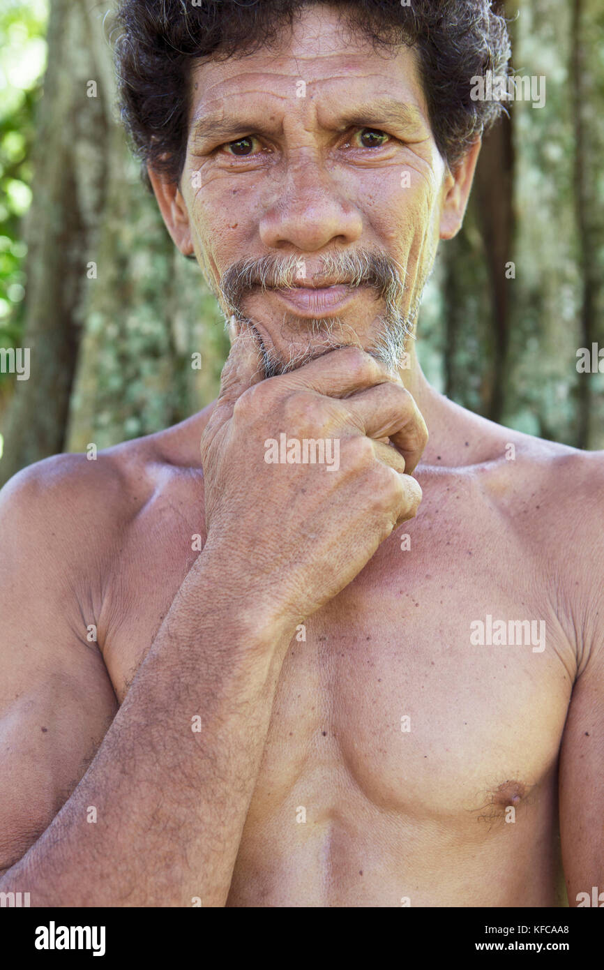 FRENCH POLYNESIA, Tahaa Island. Tetumu Tapi, a taro farmer in his farm ...