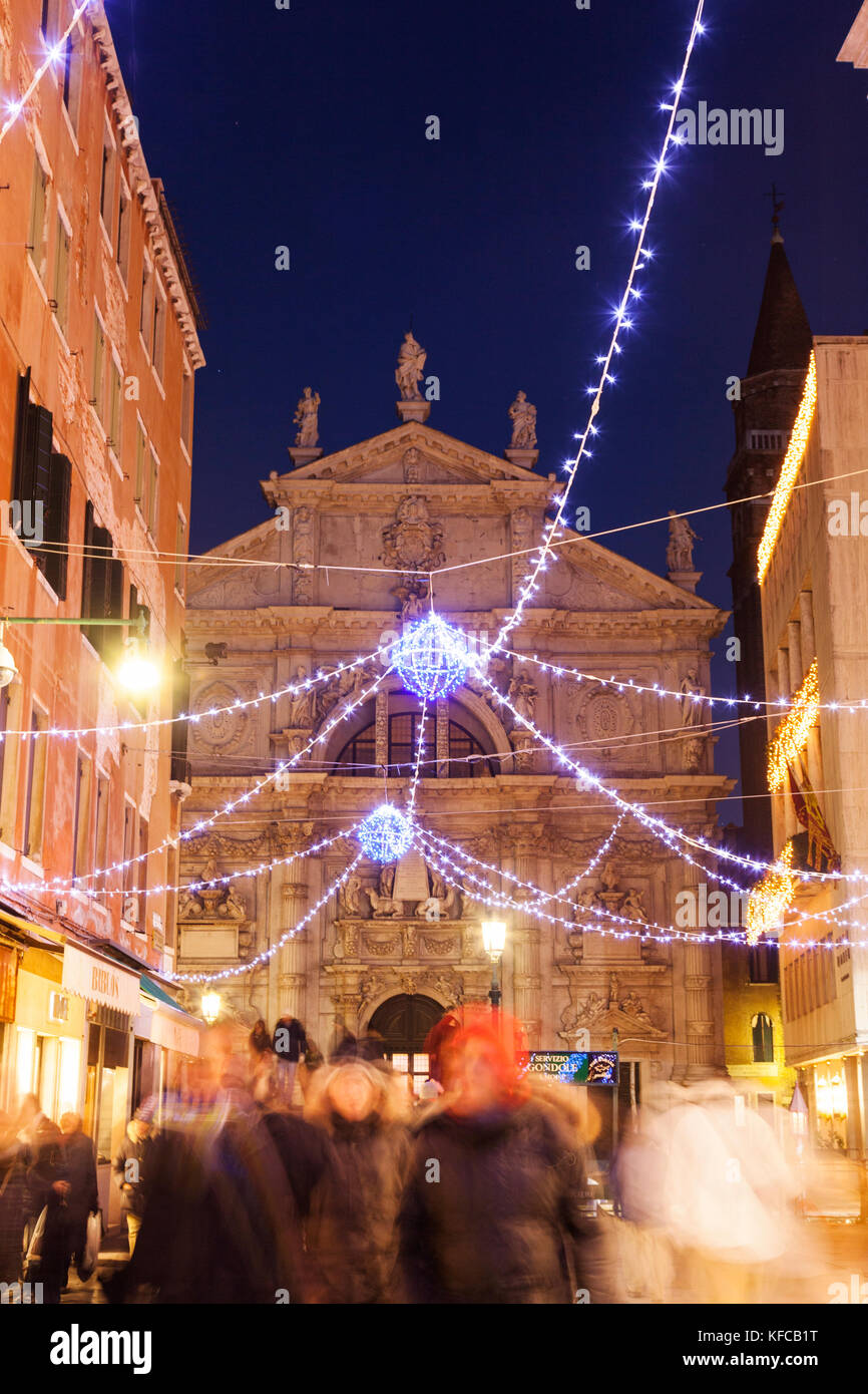 ITALY, Venice. Christmas decorations hangs over Campo San Moise along ...