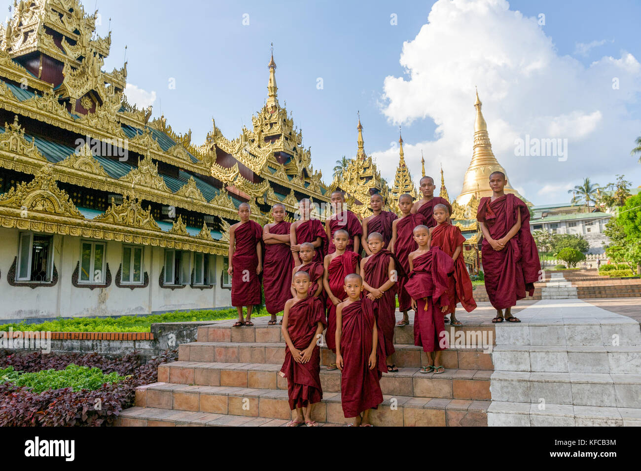 Myanmar (formerly Burma). Yangon. (Rangoon). Young monks in front of ...