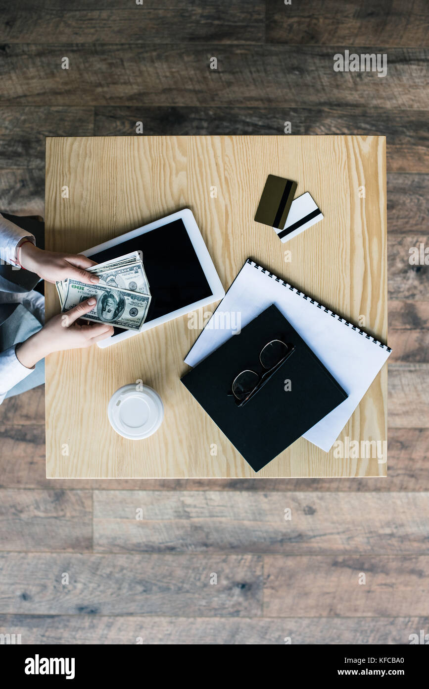 Business person counting money table hi-res stock photography and ...