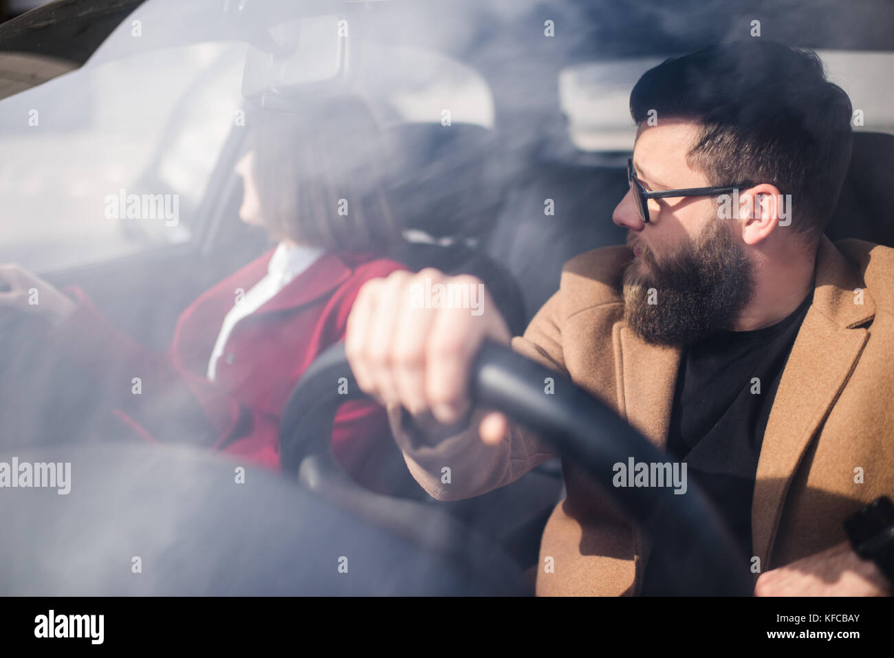 couple riding car Stock Photo - Alamy
