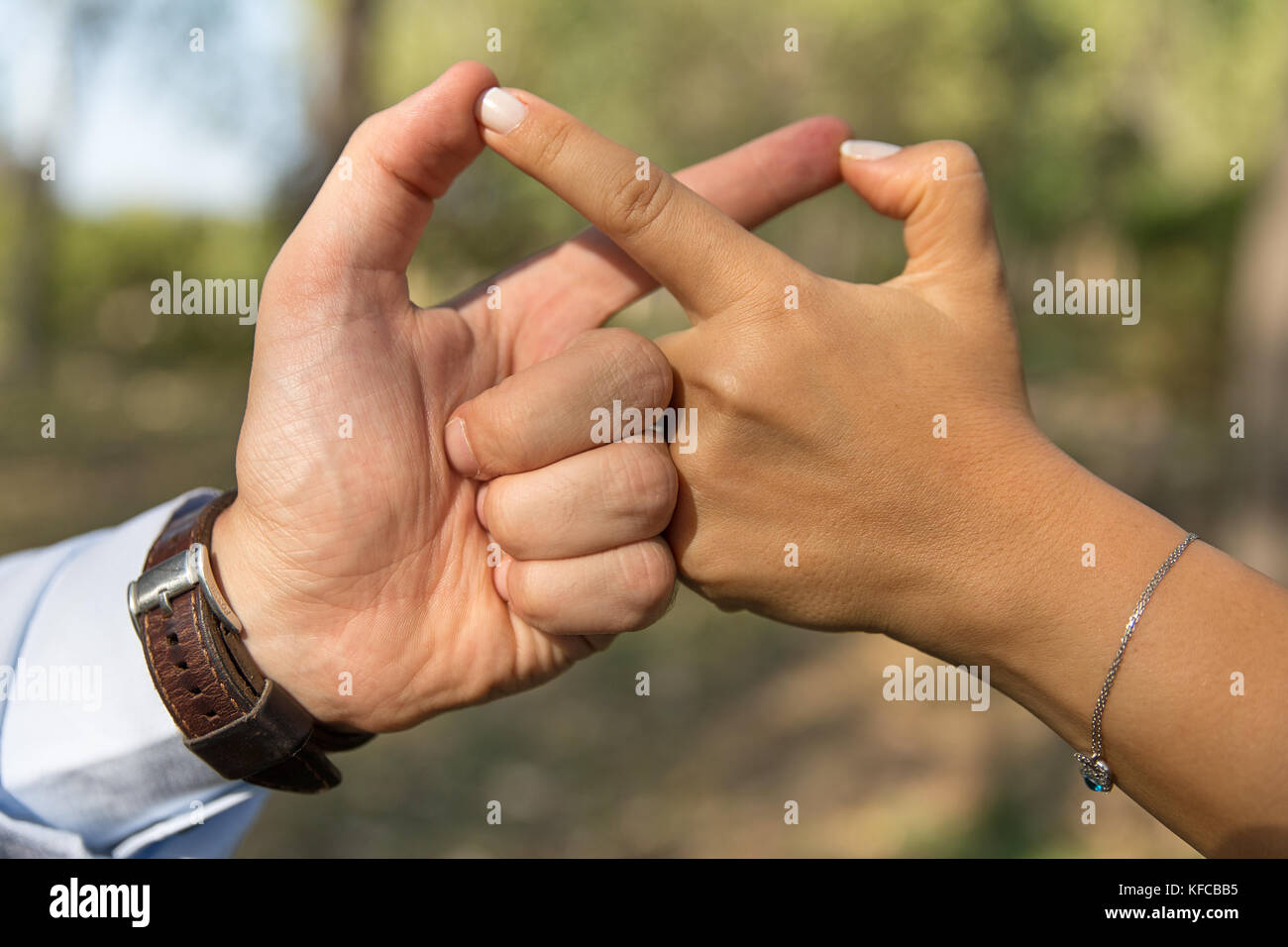 Infinity symbol hands hi-res stock photography and images - Alamy