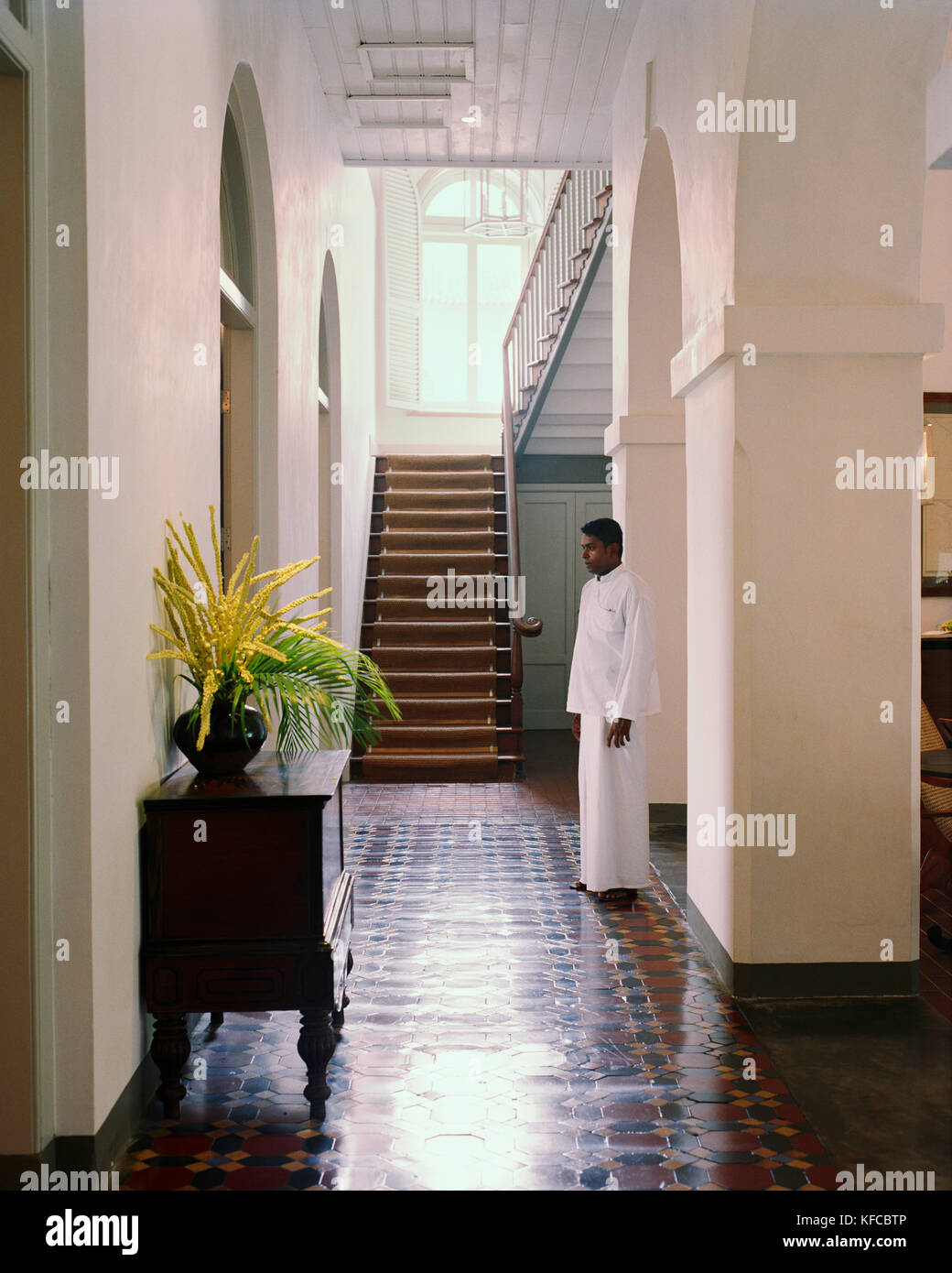 SRI LANKA, Asia, Galle, butler standing inside the Amangalla Hotel ...