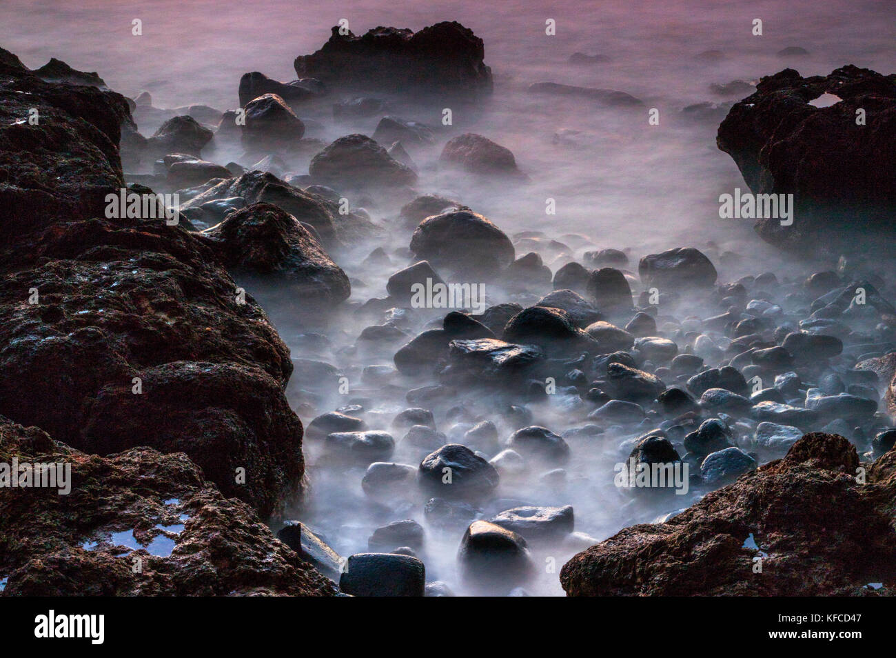 HAWAII, Oahu, North Shore, Big Swell rolling in at sunset at Pupukea ...