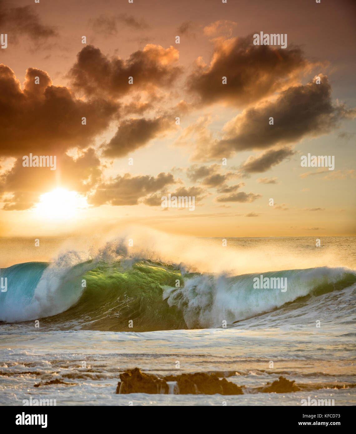 HAWAII, Oahu, North Shore, a large wave crashing an outside point near ...