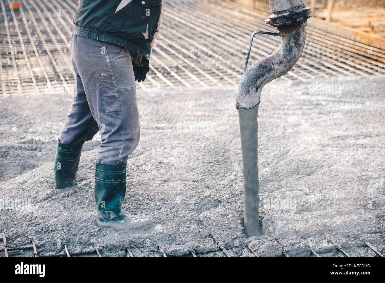 Concrete pouring during commercial concreting floors of buildings in ...