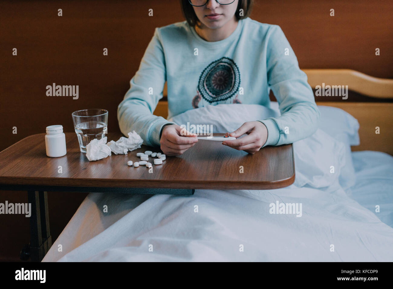 sick person taking medicine Stock Photo - Alamy