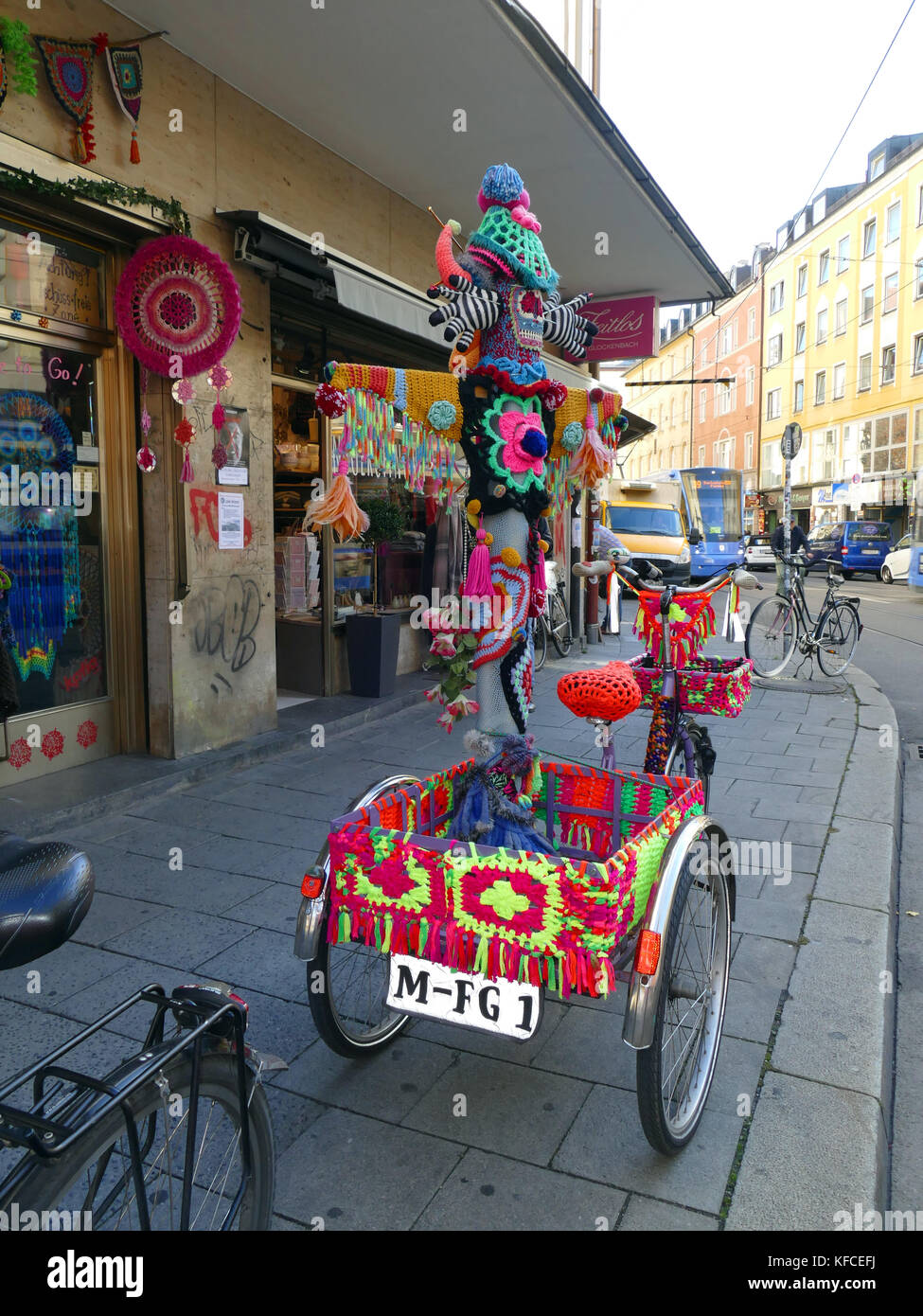 Colorful tricycle Wool supply shop in downtown Munich Germany Europe ...
