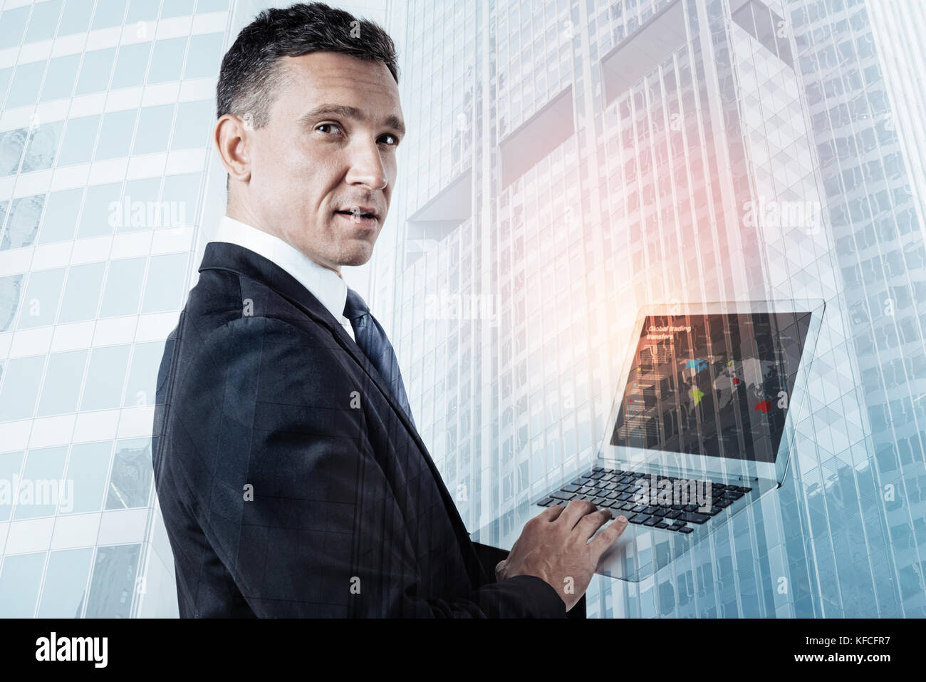 Serious smart businessman thinking about his project Stock Photo - Alamy