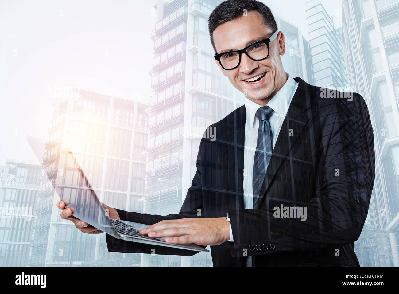 Smart positive businessman being at work Stock Photo - Alamy